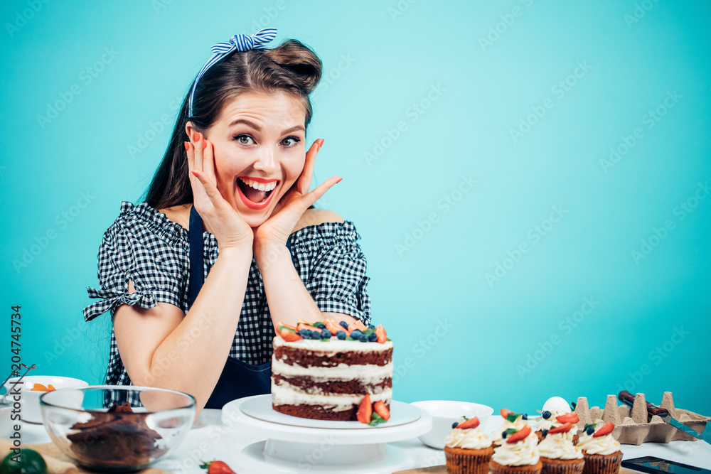 A young, beautiful girl shows an emotion of hapyness and joy. Isolated ...
