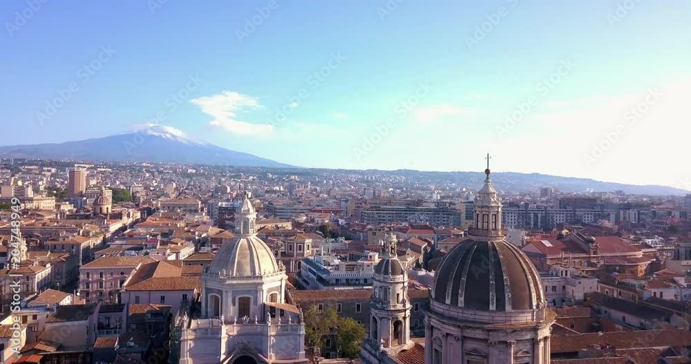 Beautiful aerial view of the Catania city with main Cathedral and Etna ...