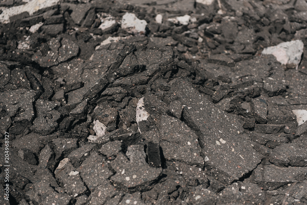 Old cracked asphalt road scrapheap damage on the ground to be recycled ...