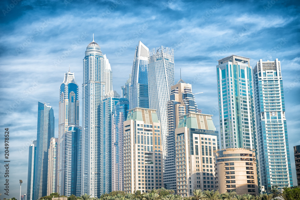 skyscraper buildings on sunny day on blue sky background. Business ...