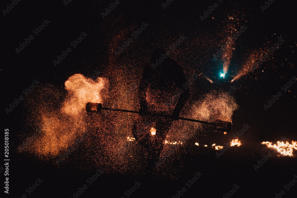 Fiery show with sparks, at a short shutter speed with additional light ...