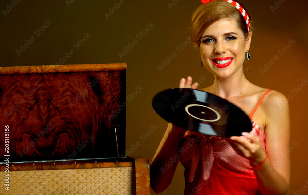 Retro woman with music vinyl record and gramophone. Pin-up retro female ...
