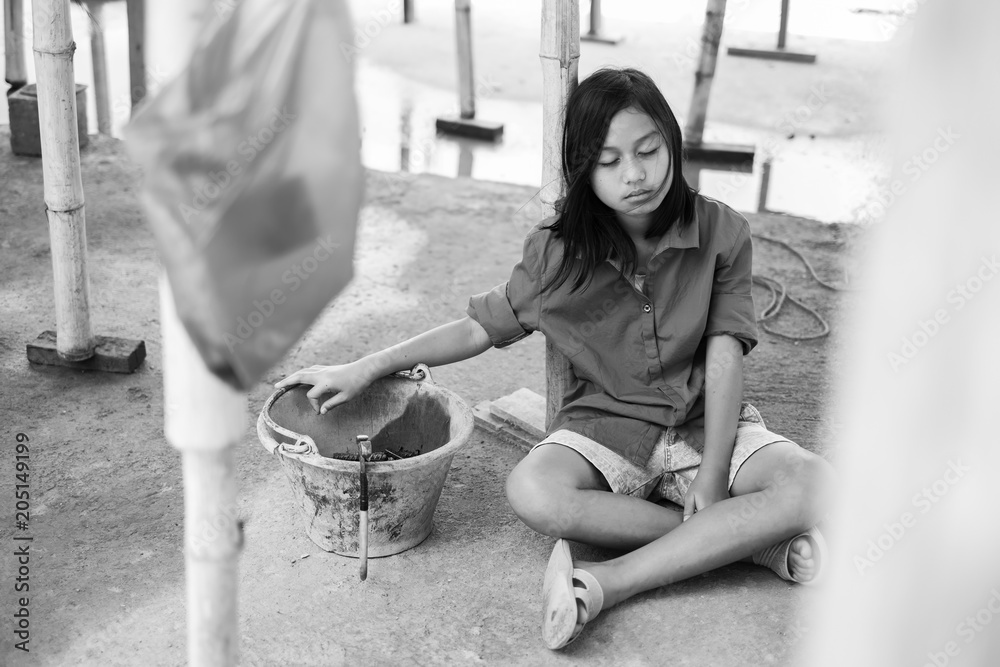 Little girl labor working in commercial building structure, World Day ...