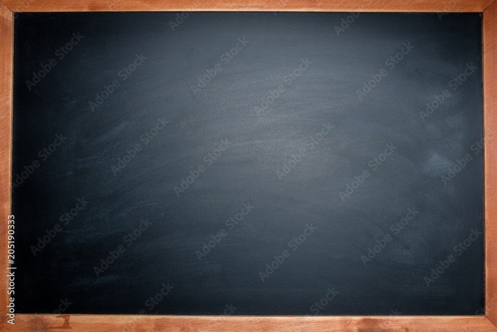 Chalk rubbered out on blank blackboard around with wooden frame for ...