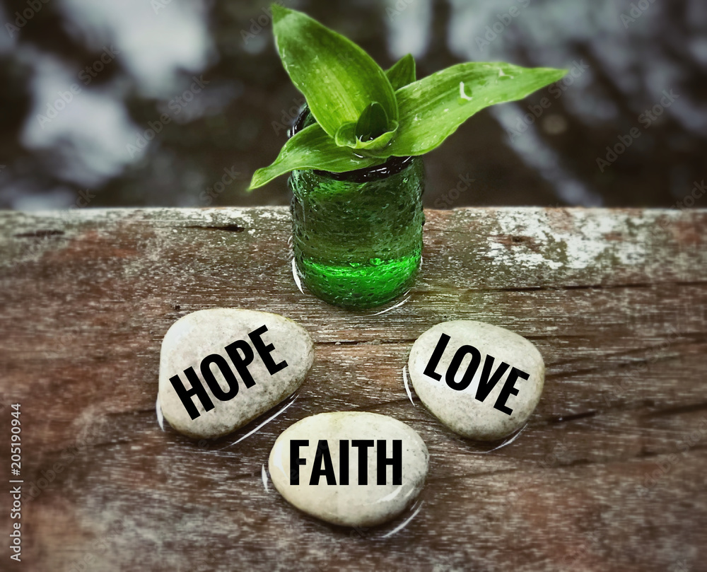 Religion and belief concept - ‘Hope, faith and love’ words on white ...