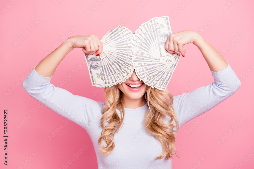 Portrait of crazy playful foolish girl with beaming smile holding fans ...
