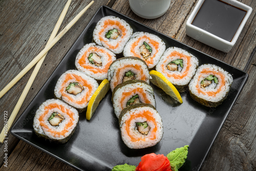 Rainbow Sushi Roll with salmon, eel, tuna, avocado, royal prawn, cream ...