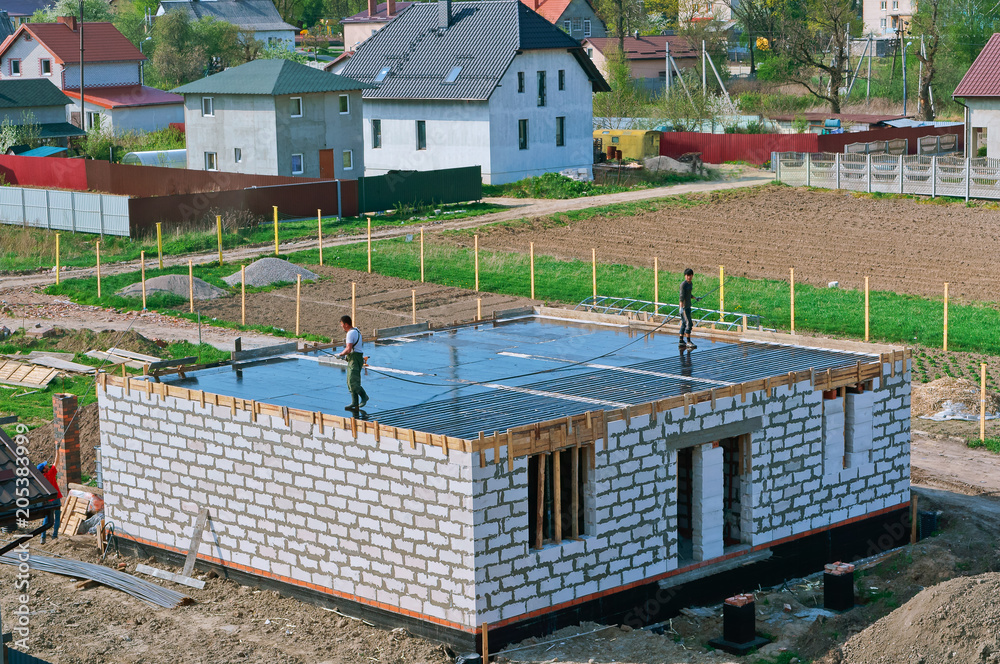 The Foundation of the house under construction. Fresh concrete ...