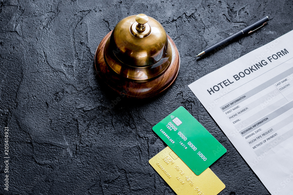 hotel reception desk with booking form dark background Stock Photo ...
