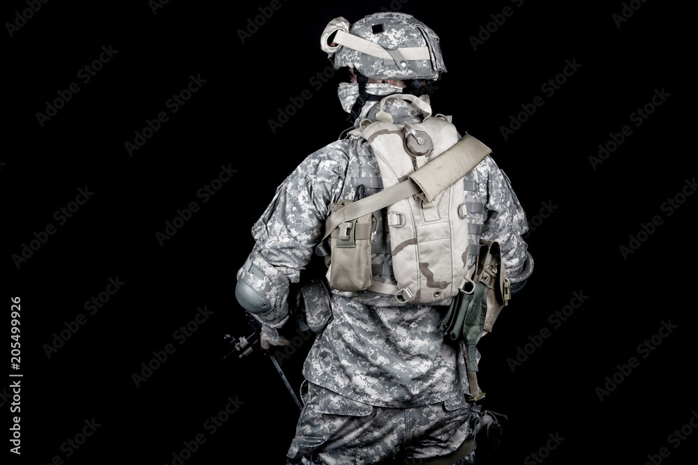 Back view of modern military forces infantry, US marine armed with ...