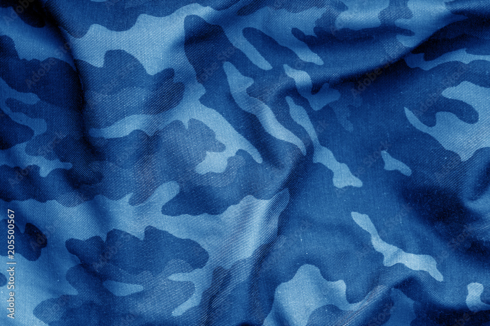 Military uniform pattern with blur effect in blue tone. Stock Photo ...