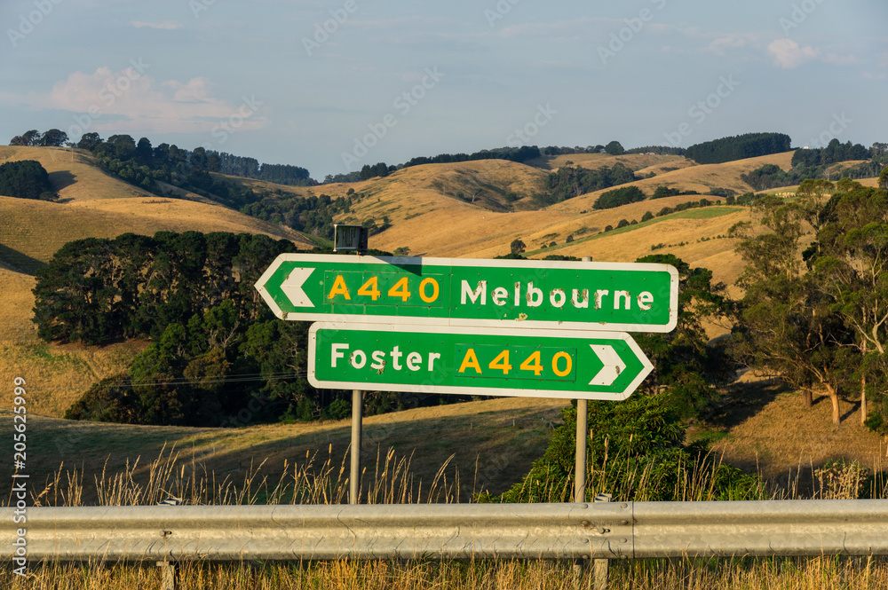 Road signs pointing towards Foster and Melbourne in South Gippsland ...