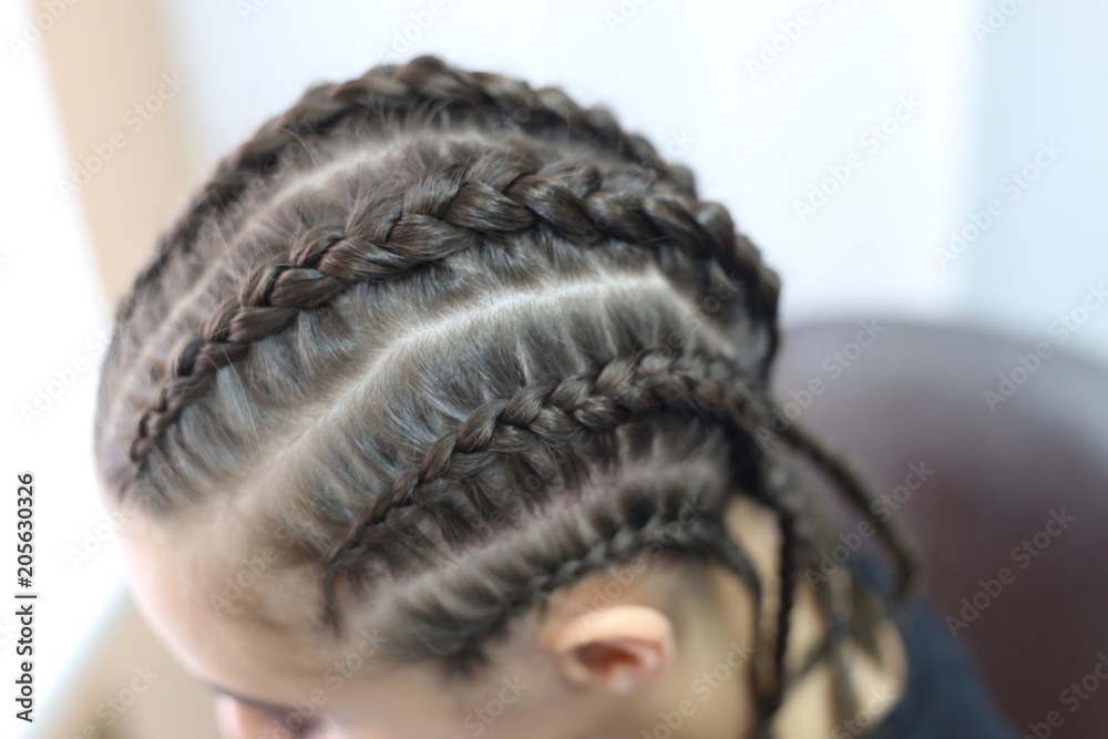 Foto de four braids, five thick plaits, a youth hairstyle with a ...