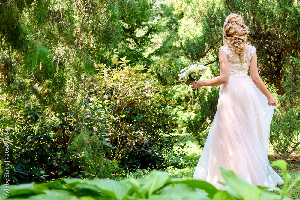 Full length body portrait of beautiful bride in fashion wedding dress ...