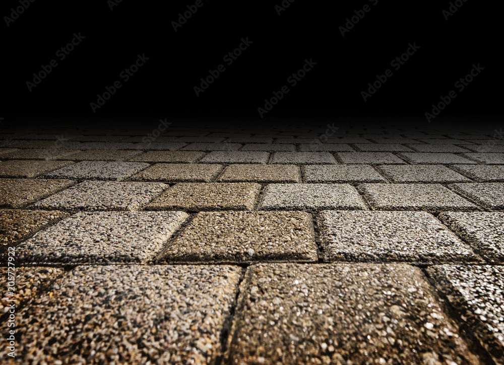 Rough stone block footpath floor texture perspective to black ...