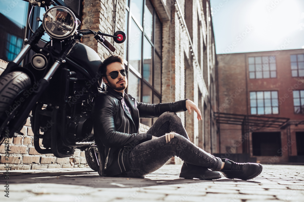 Biker with modern motorcycle Stock Photo | Adobe Stock