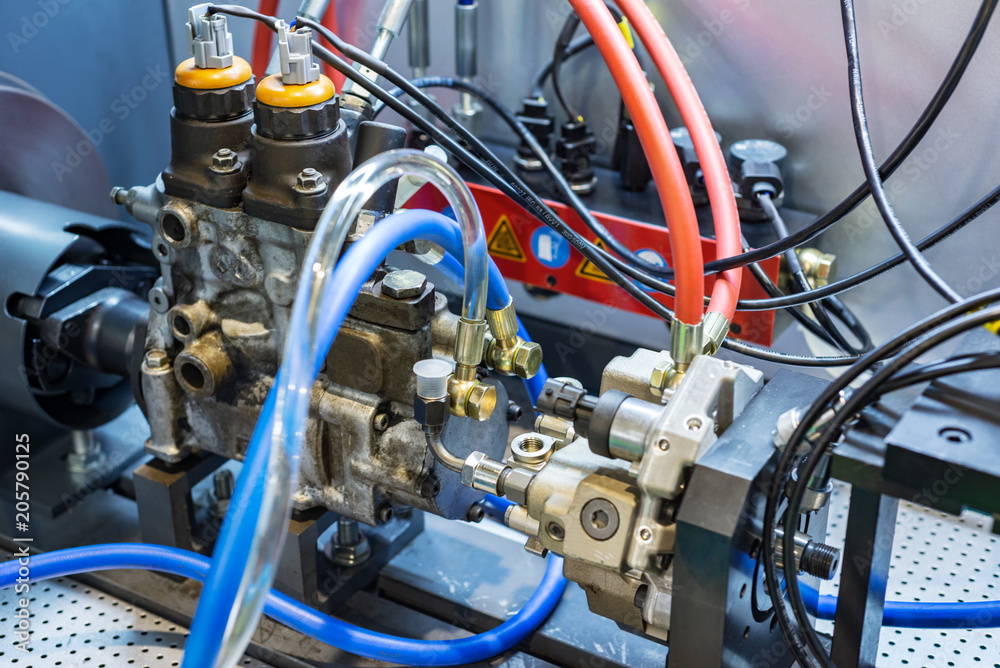Stand for checking and adjusting injection pump. Stock Photo | Adobe Stock