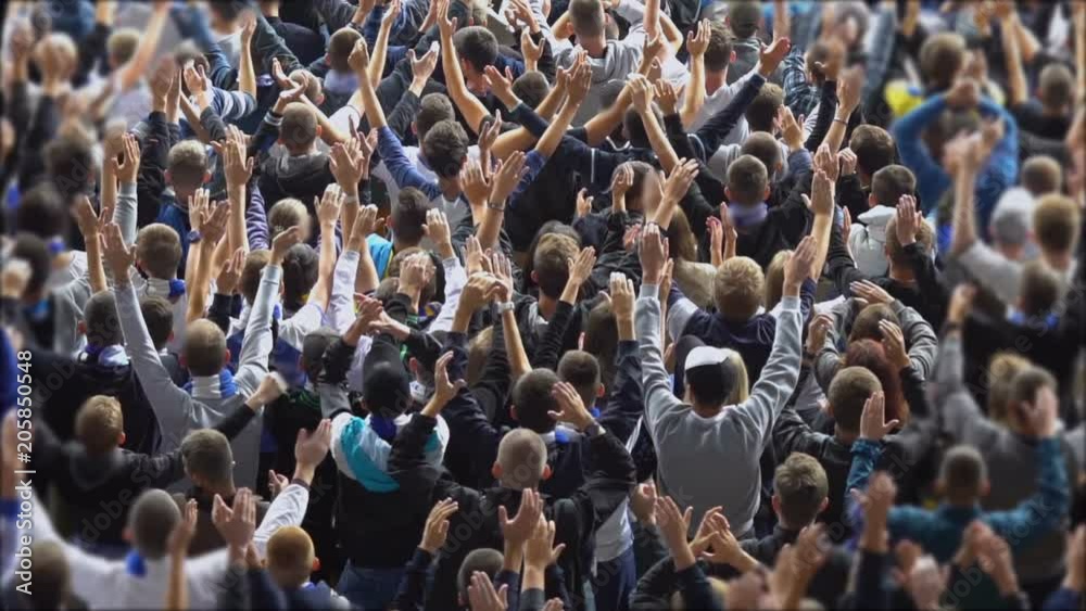 Large crowd of football (soccer) fans clapping hands, supporting their ...