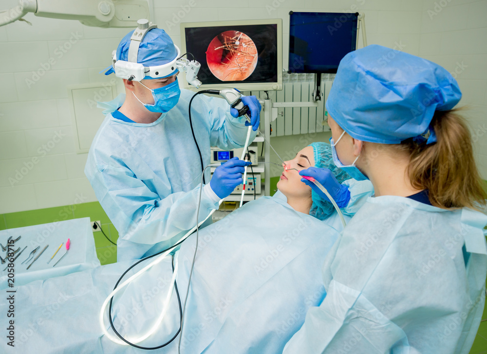 Endoscopic sinus surgery. Laser vaporization of nasal concha Stock ...
