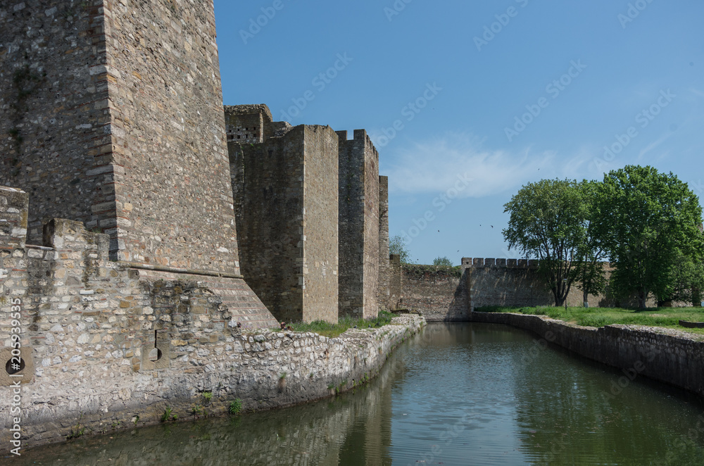 Wall, moat and towers of Smederevo Fortress is a medieval fortified ...