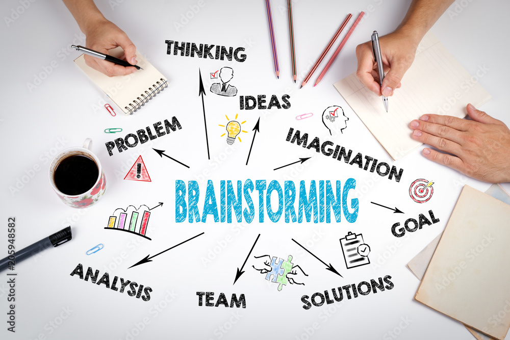 Brainstorming Concept. Chart with keywords and icons. The meeting at the white office table ...