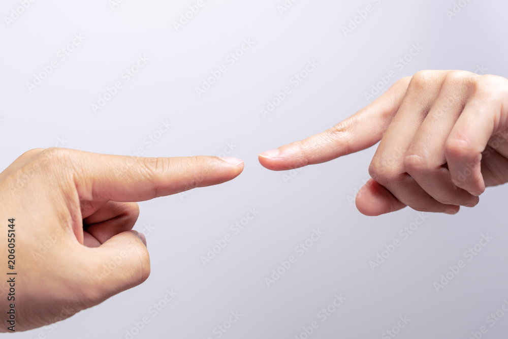 finger point touching men and women hands reaching towards each other ...