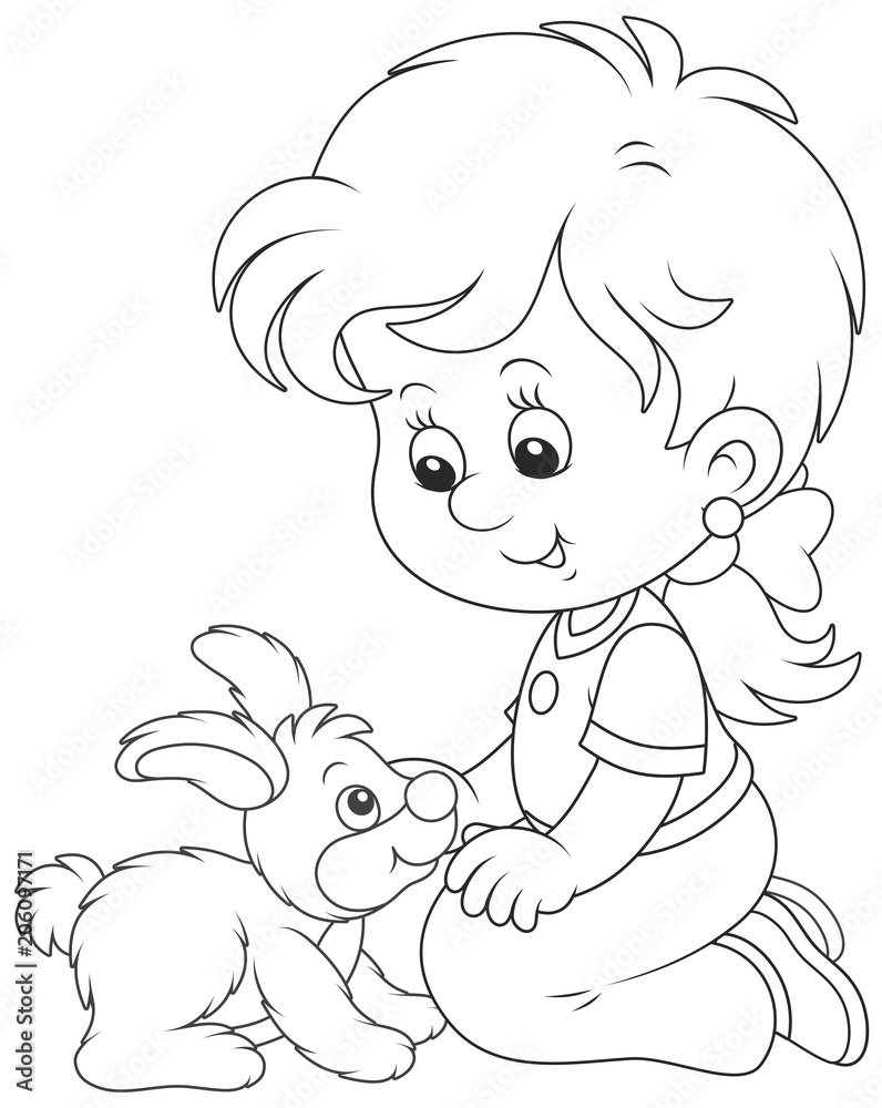 Little smiling girl playing with her small rabbit, black and white ...