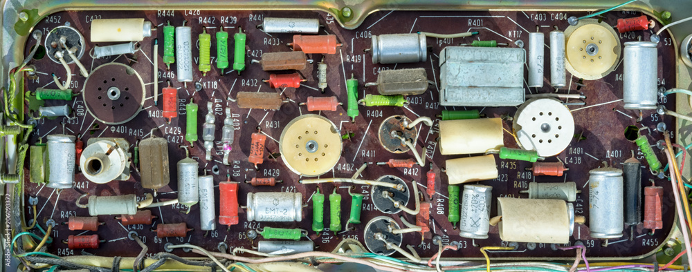 Old manually hand-welded chip with a lot of transistors and wires ...