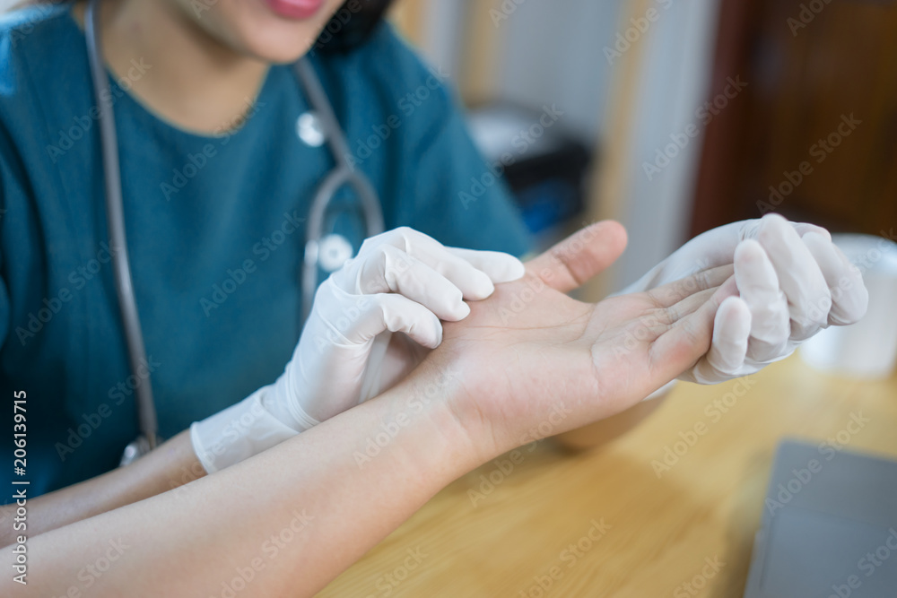Doctor hand Physicist physical therapy treatment patient in the clinic ...