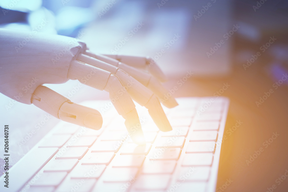 Robot finger point to laptop button with flare light and HUD effect ...