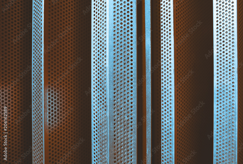 Perforated metallic wall with bars as a frame for finishing work Stock ...