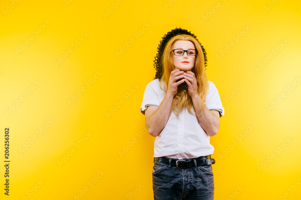 Excited bizarre strange odd foolish guy have fun with plastic mannequin ...