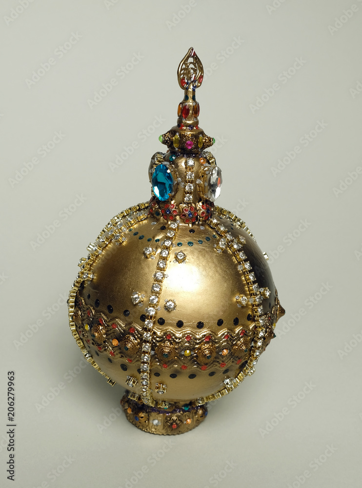 Golden royal regalia and symbol of authority decorated with gems Stock ...