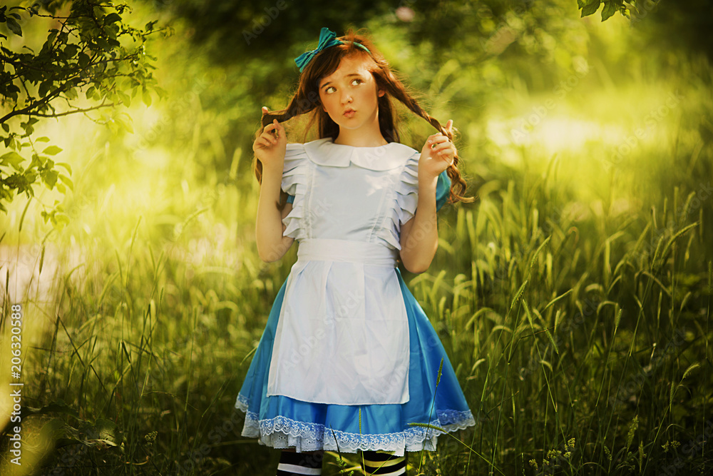 Alice in Wonderland.little girl in costume alice in wonderland Stock ...