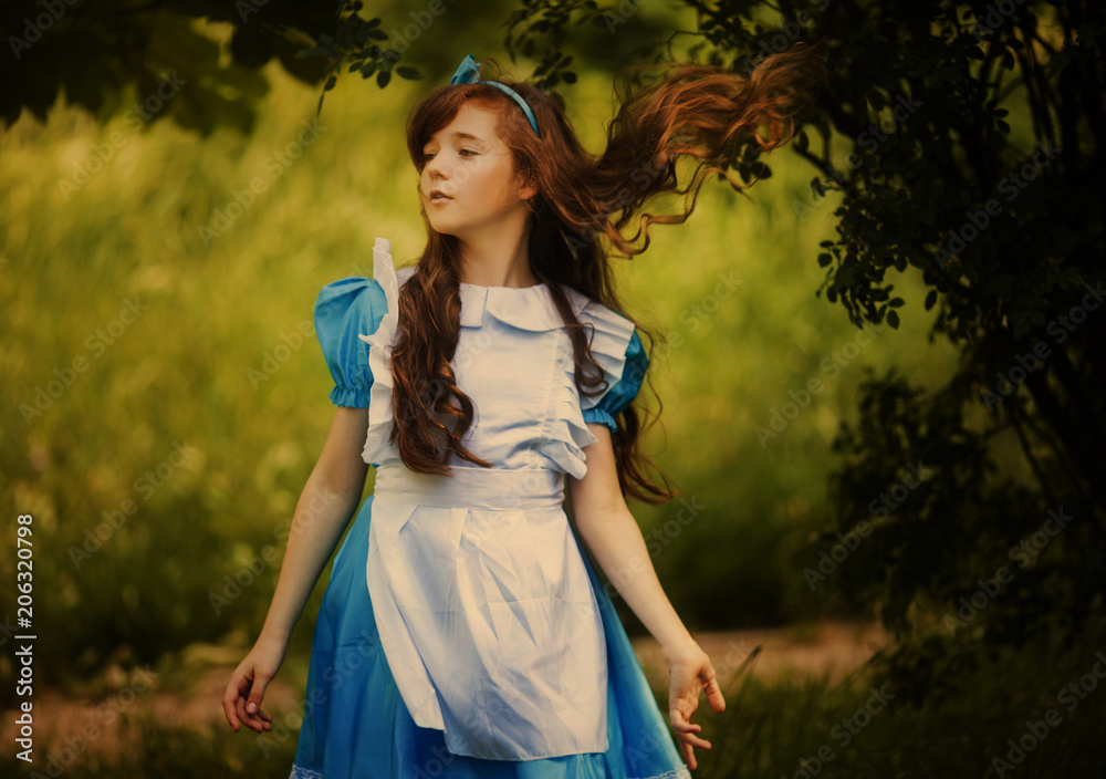 Alice in Wonderland.little girl in costume alice in wonderland Stock ...