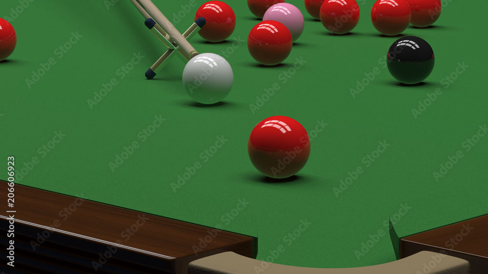Snooker balls on green billiard table and cue on cross section rest ...