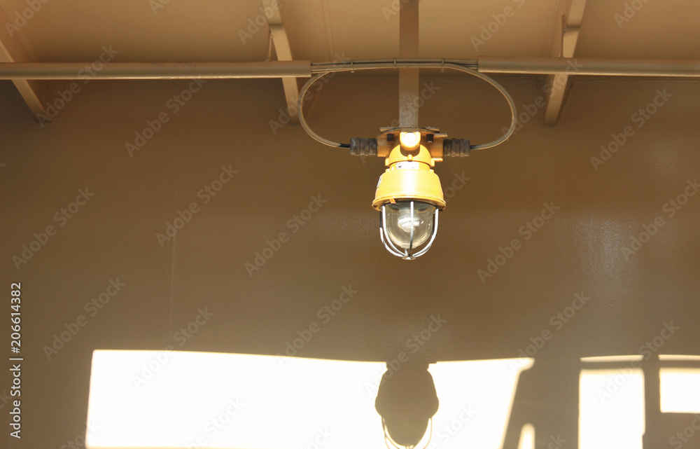 Yellow Lamp on Ship Deck Surrounded by Metal Rustic Frame Fixed to a ...