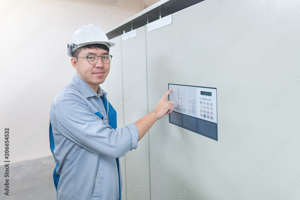 Engineer working and check status electrical panel energy distribution ...