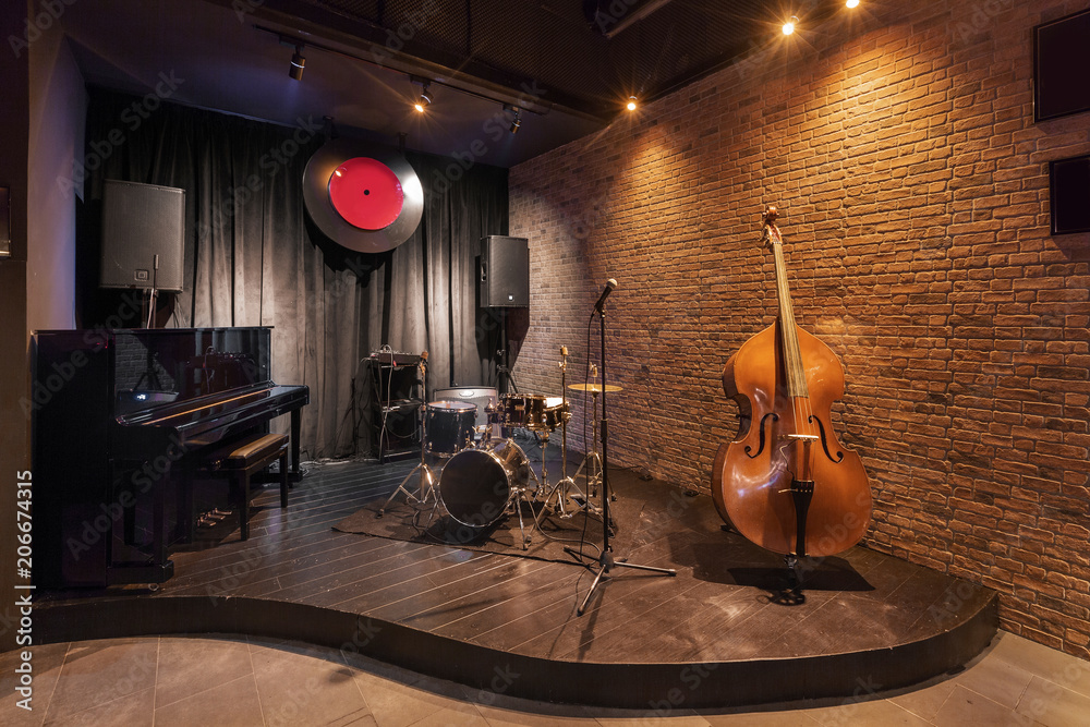 Modern Jazz Bar Interior Design Stage With Black Piano And Cello Stock