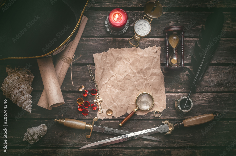 Pirate captain table with crumpled paper page with copy space for ...