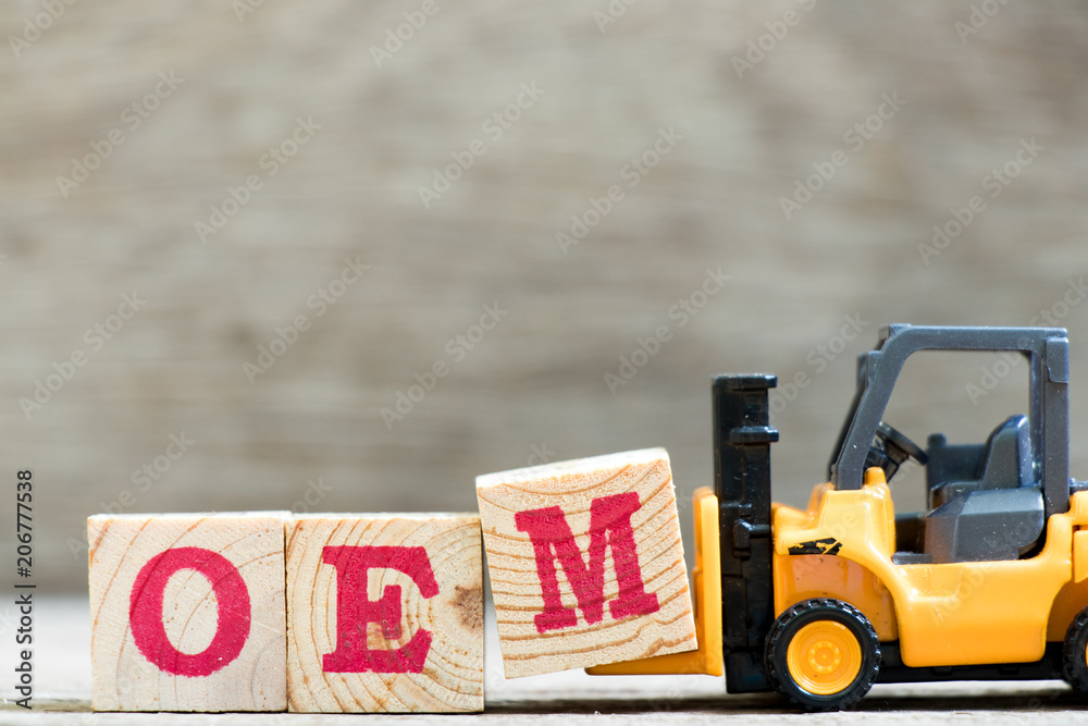 Photo And Art Print Toy Forklift Hold Letter Block M In Word Oem Abbreviation Of Original