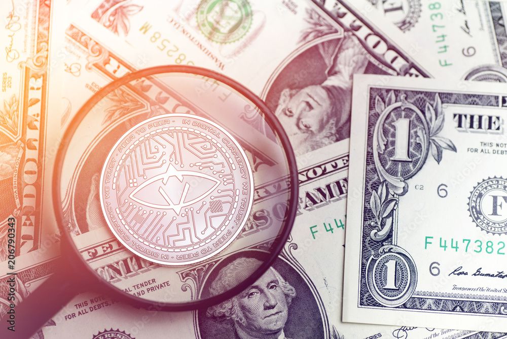 shiny golden SINGULAR DTV cryptocurrency coin on blurry background with ...