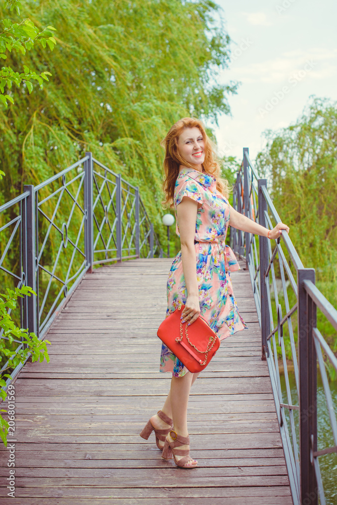 Woman rest on a nature. Concept of vacation or weekend. Young stylish ...
