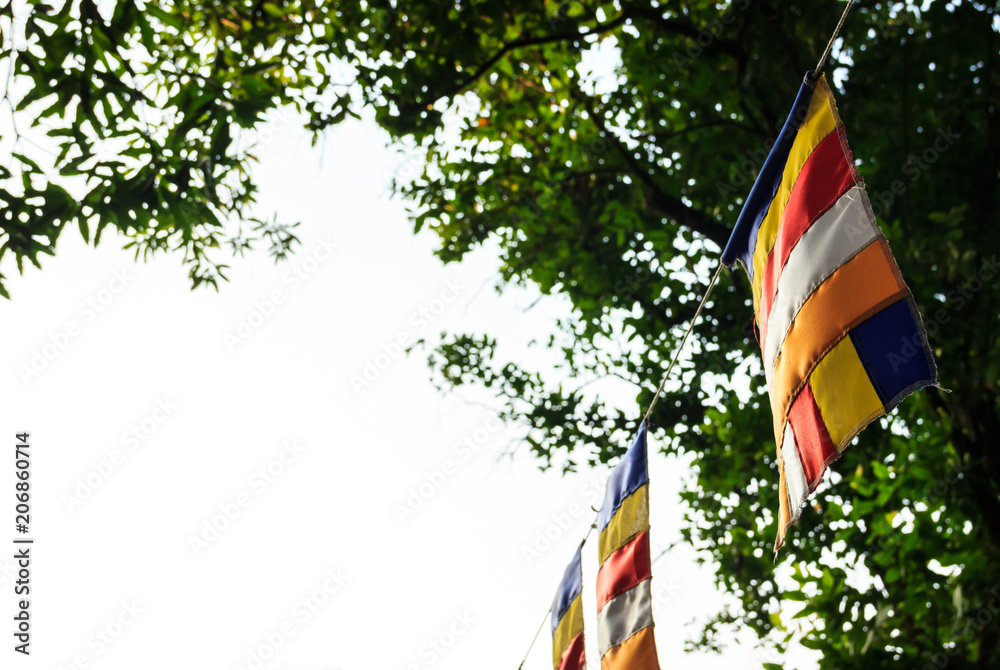 Buddhist flags in Buddhist temple with copy space. Symbol of Worship ...