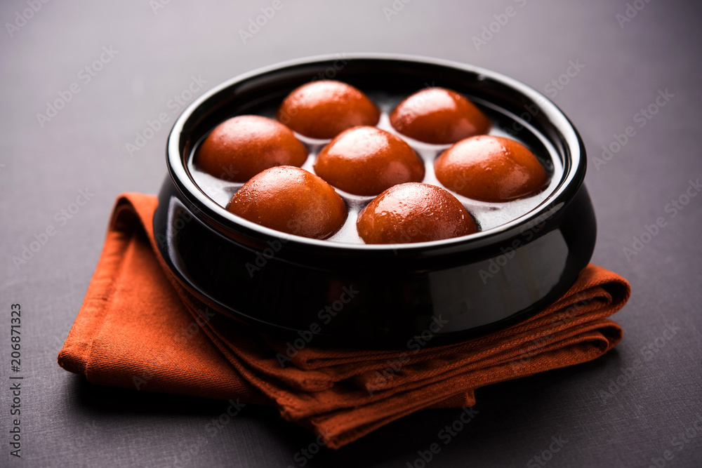 Sweet Gulab Jamun in terracotta bowl Stock Photo | Adobe Stock