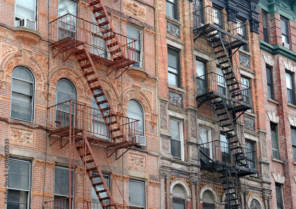 Fire escape and stairs on exterior of walk up apartment building Stock ...
