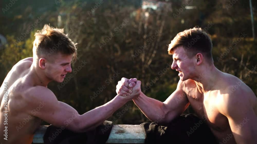Vídeo do Stock: Arms wrestling, competition. Rivalry concept - close up ...