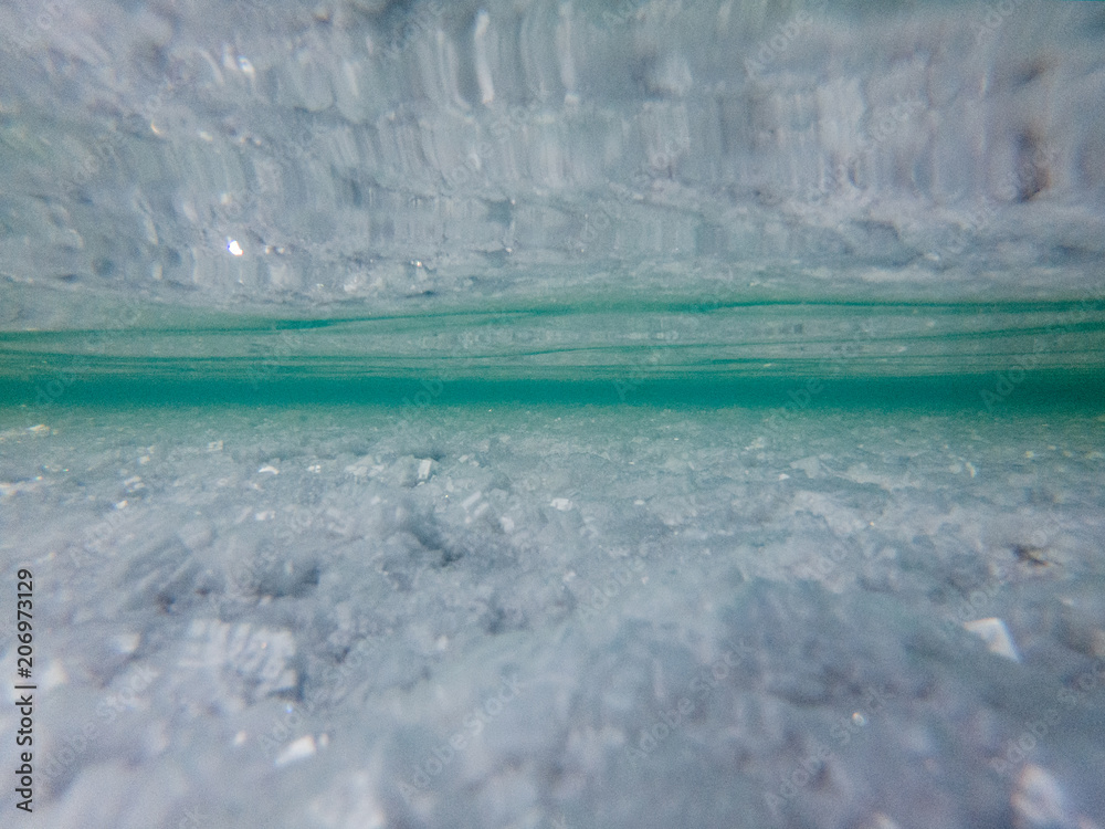 Underwater view of a salty lake which is located at Uyuni salt flat in ...
