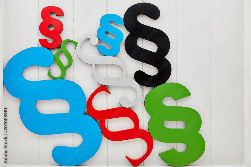 Recht und Gesetz Symbol mit vielen Paragraphen Stock Photo | Adobe Stock