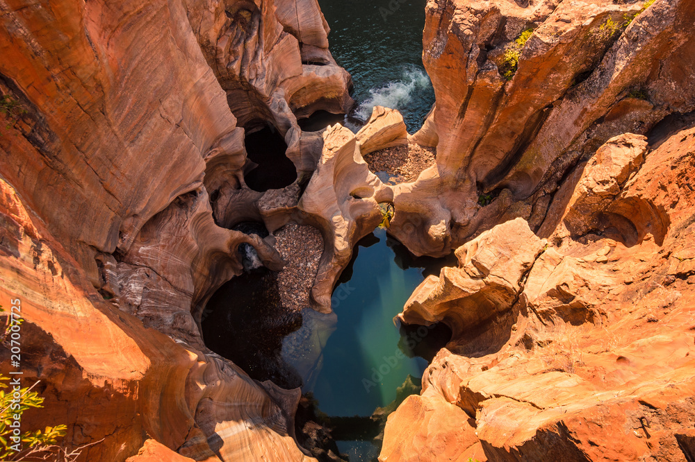 A view looking down on the the plunge pools at Bourke’s Luck Potholes ...